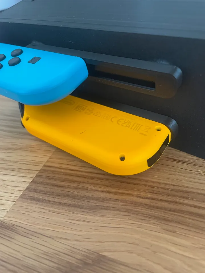 Nintendo Switch Joy-Con Rails by EmberWork | Download free STL model ...