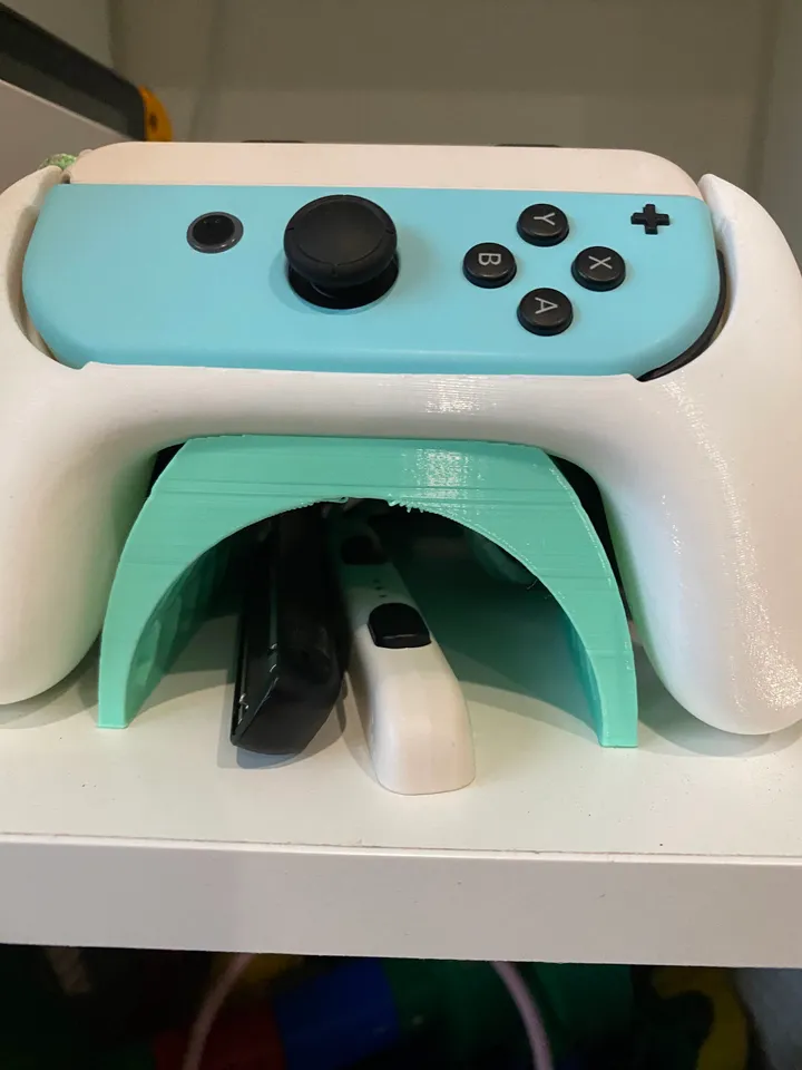 Nintendo Switch Joy Con Holder by Zane Thomas | Download free STL model ...
