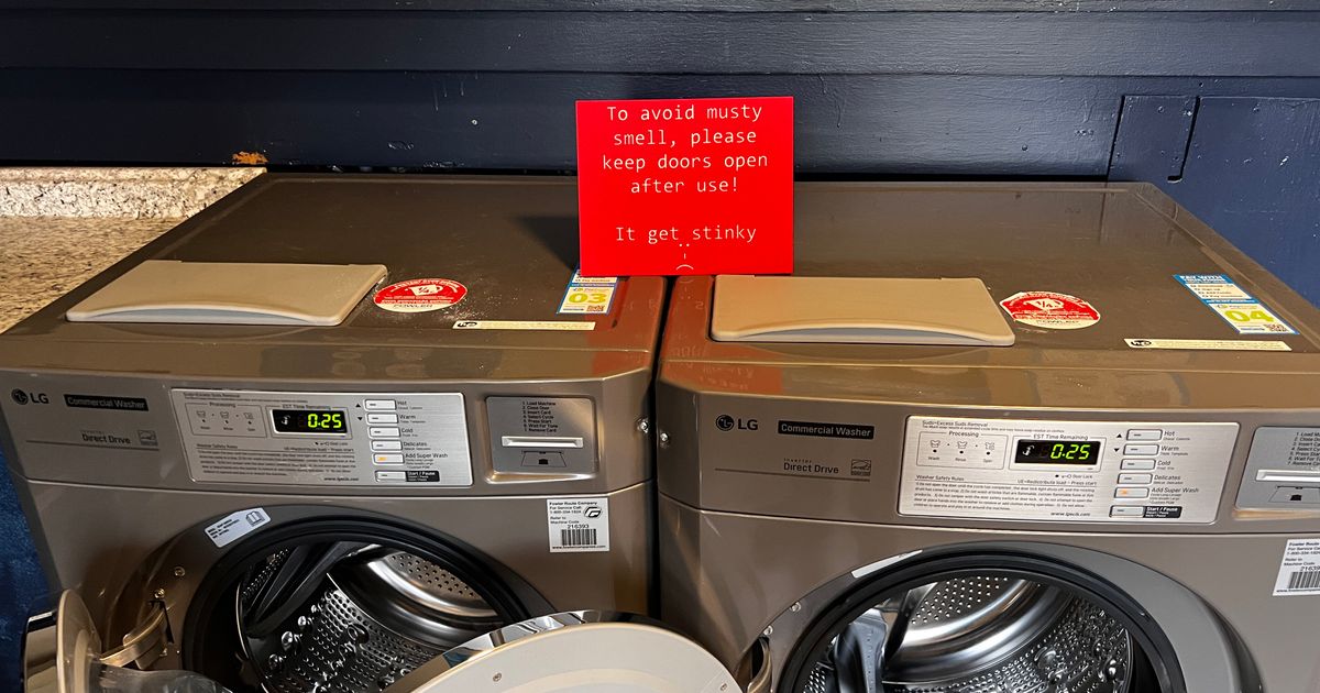 "Keep doors open" sign for shared laundry room clothes washing machine ...