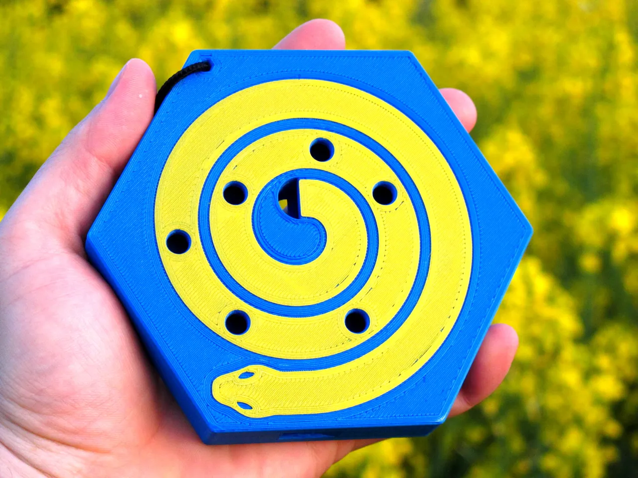 Low tone pocket snake flute rolled into the hexagonal shape by Maclab ...