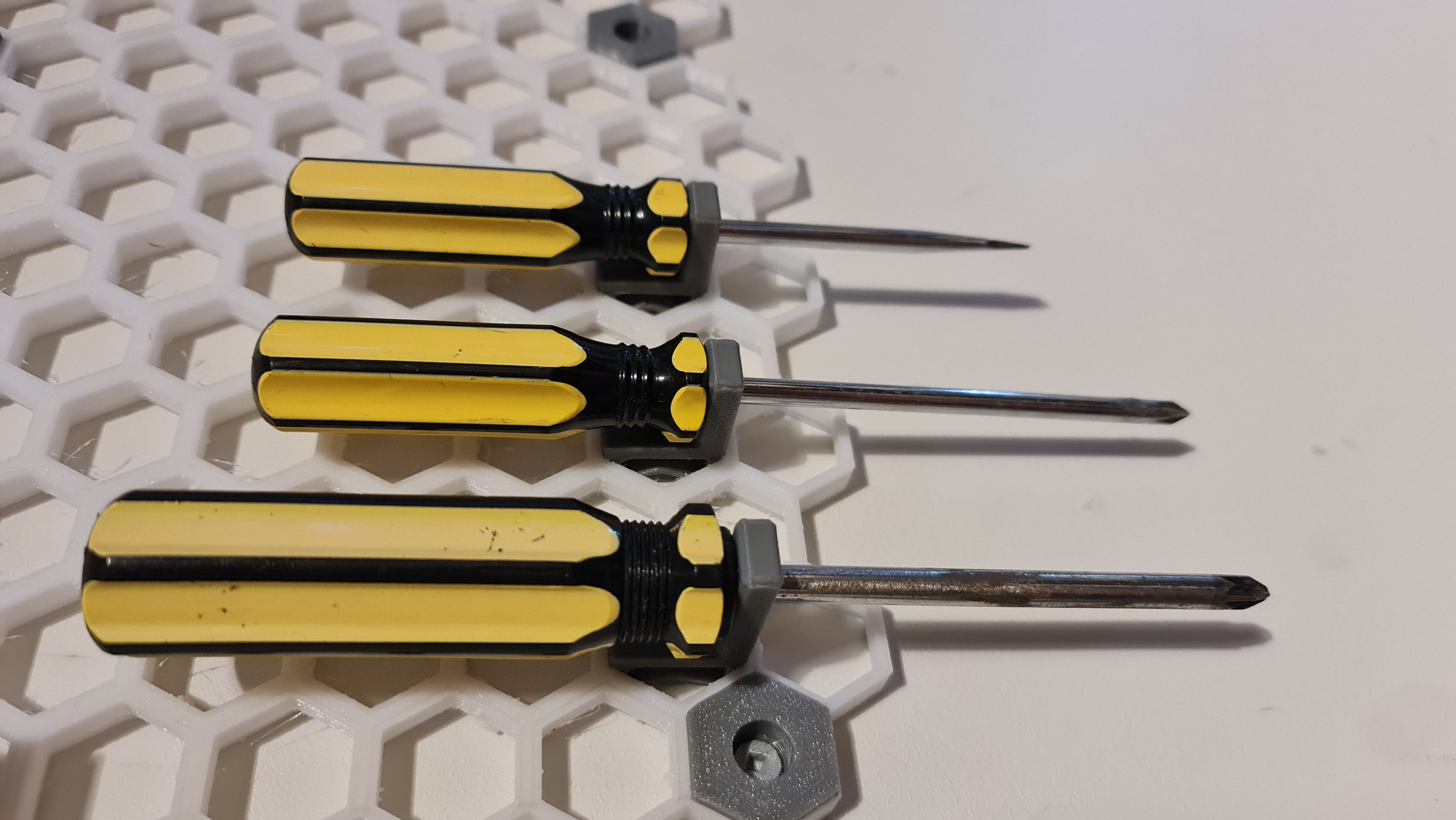 Easy clip on Screw driver holder - HSW Honeycomb Storage Wall by C4utious3D | Download free STL ...