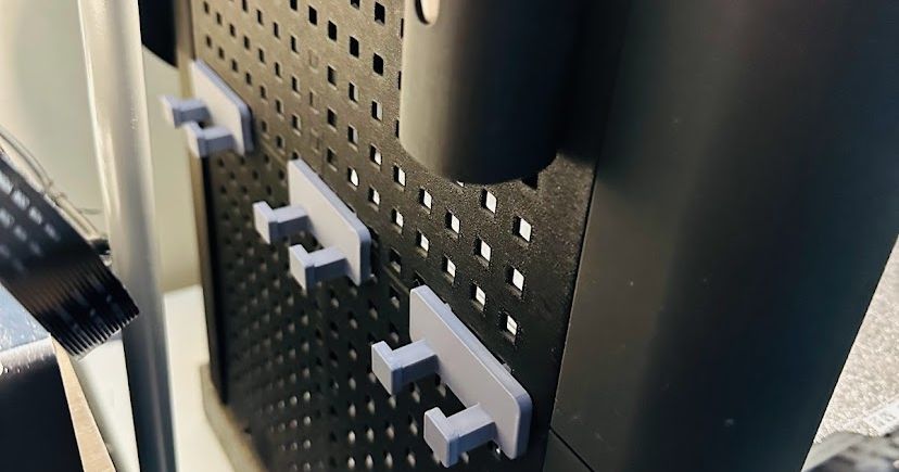 Double spaced pegboard hook connector for minimal shell enclosure by ...