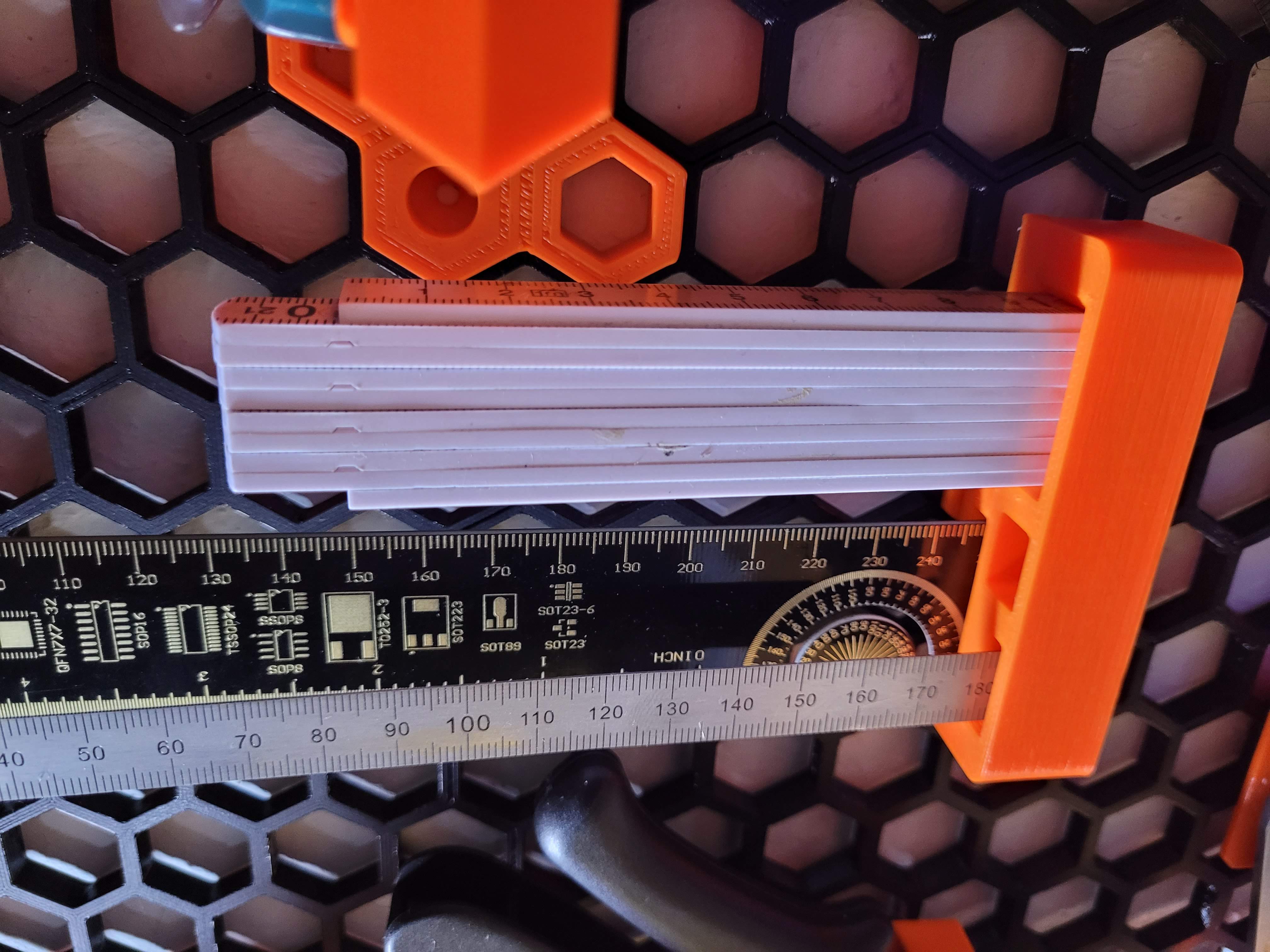 Ruler and folding tape measure holder for HoneyCombWall by Vladimír ...