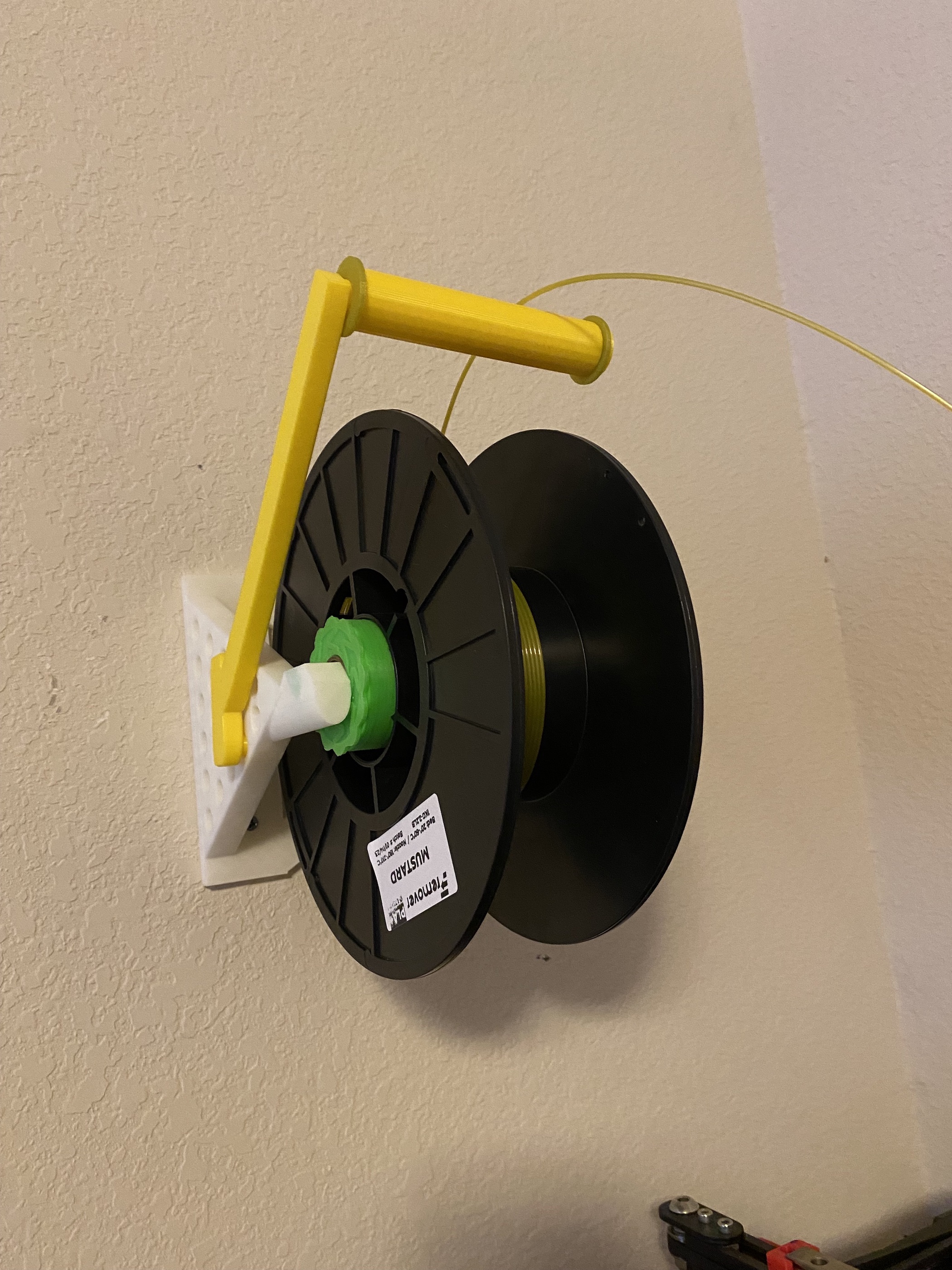 wall mounted auto rewind spool holder by ronjl | Download free STL ...