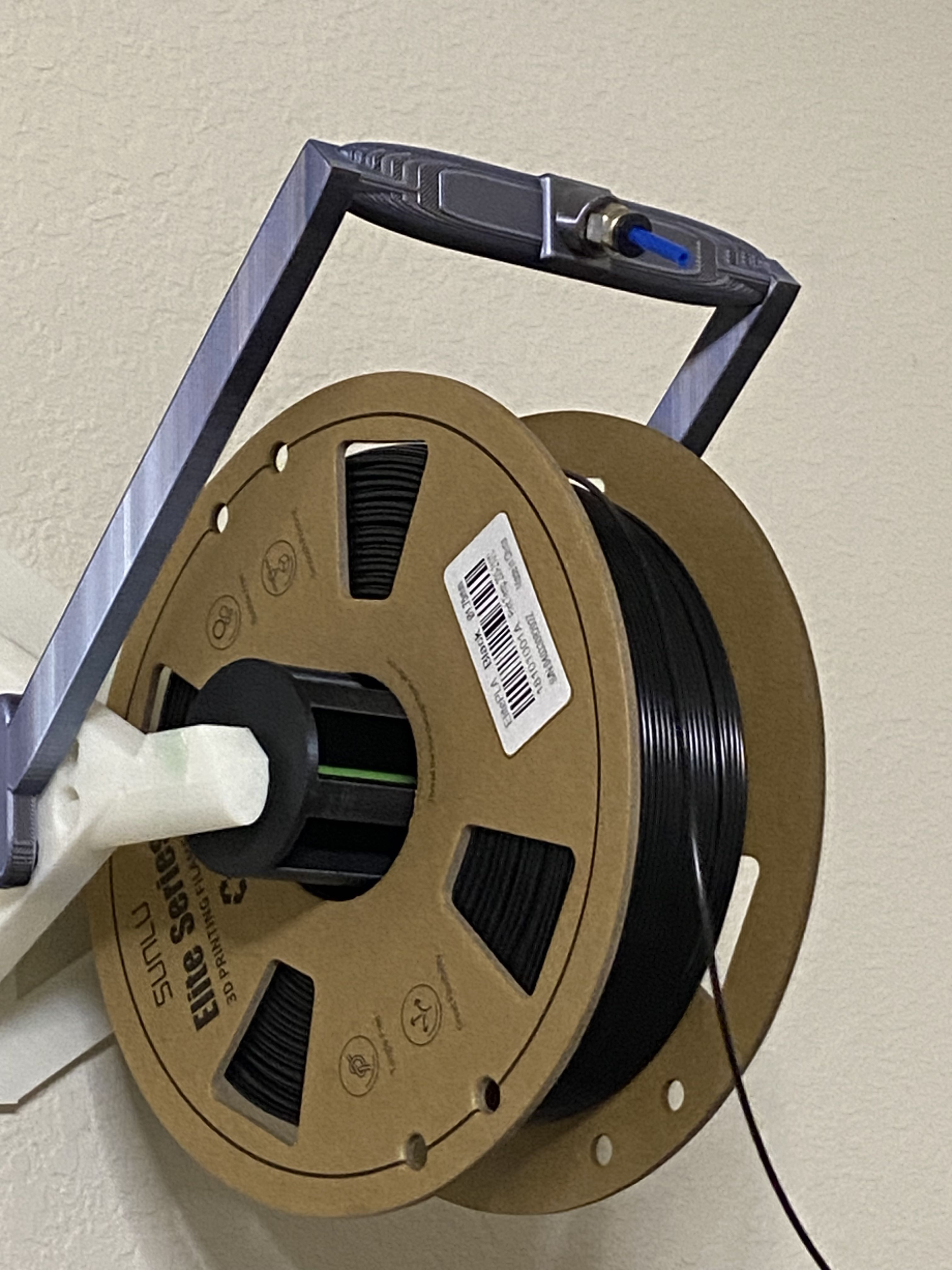 wall mounted auto rewind spool holder by ronjl | Download free STL ...