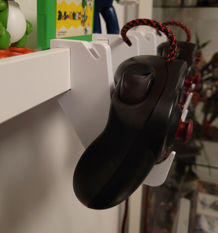 Gamecube controller (and others) supports for IKEA MOSSLANDA shelf by ...
