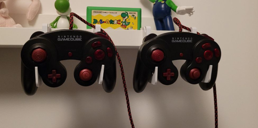 Gamecube controller (and others) supports for IKEA MOSSLANDA shelf by ...