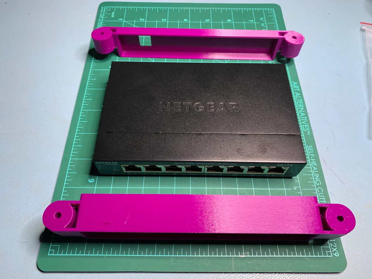 Under-shelf mount for Netgear 8-port Ethernet switch by kbob | Download ...