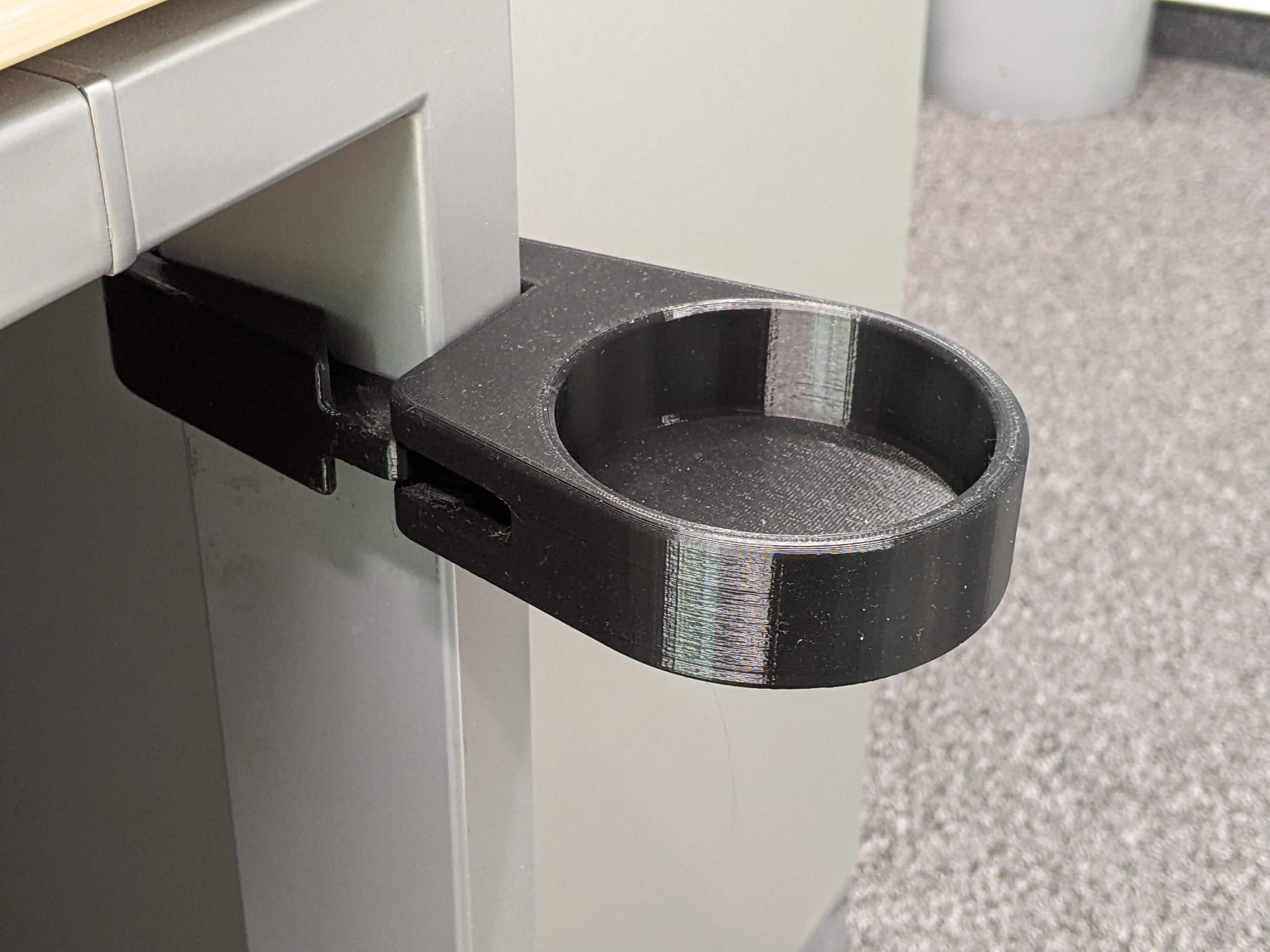 Customizable leg-clamping desk cup holder by François Laboureur ...