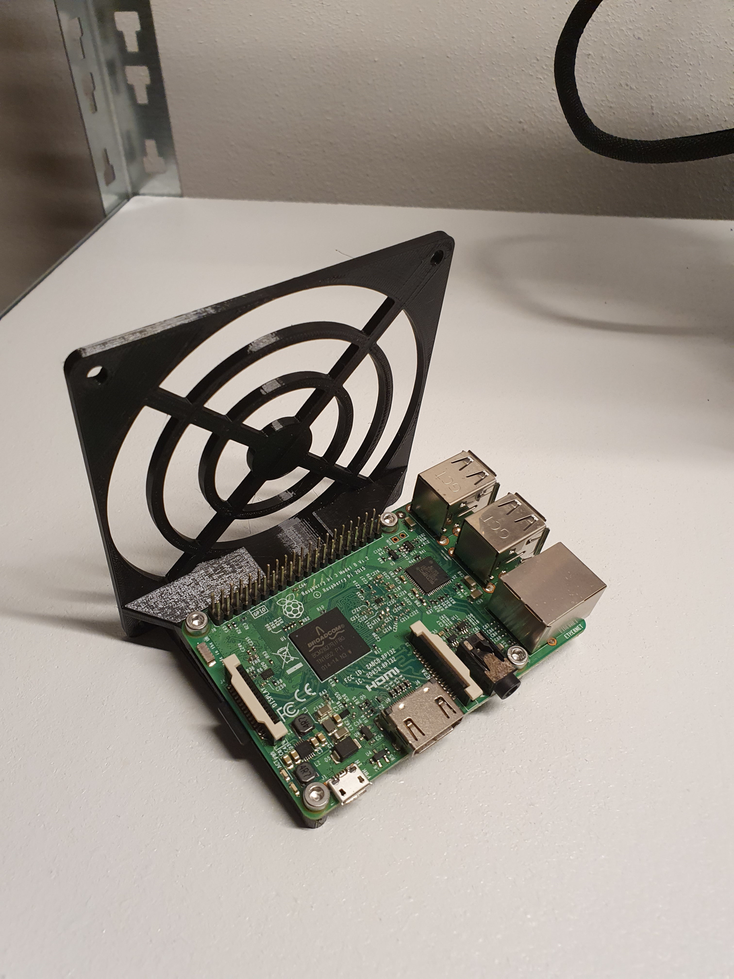 Fan grill with Raspberry pi mount by Baklin | Download free STL model ...
