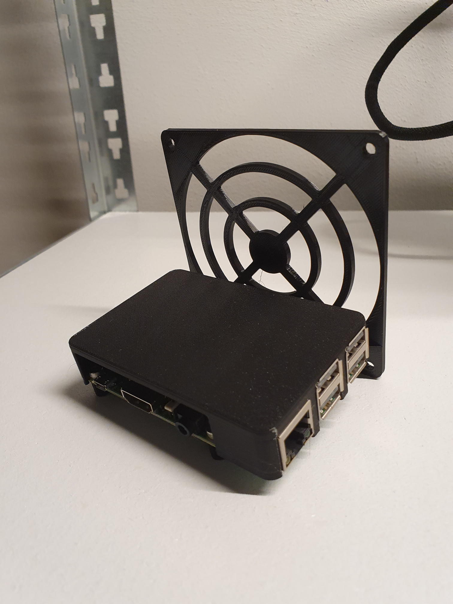 Fan grill with Raspberry pi mount by Baklin | Download free STL model ...