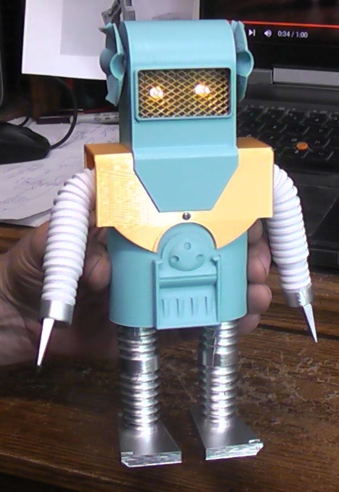 New Foki robot, lit eyes, swinging arms and waking action. N20 ...