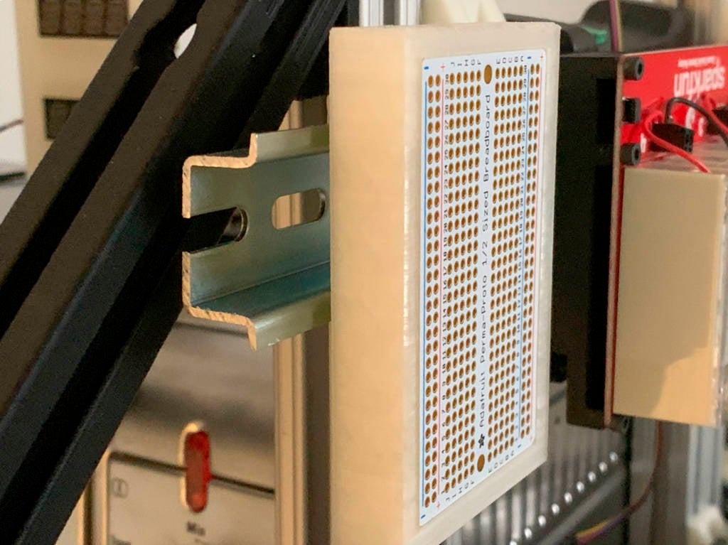 A vertical din rail mount for an Adafruit perma proto board by ...