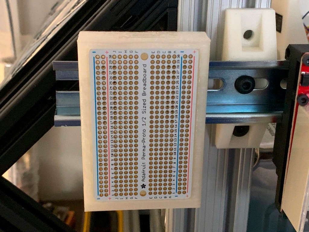 A vertical din rail mount for an Adafruit perma proto board by ...