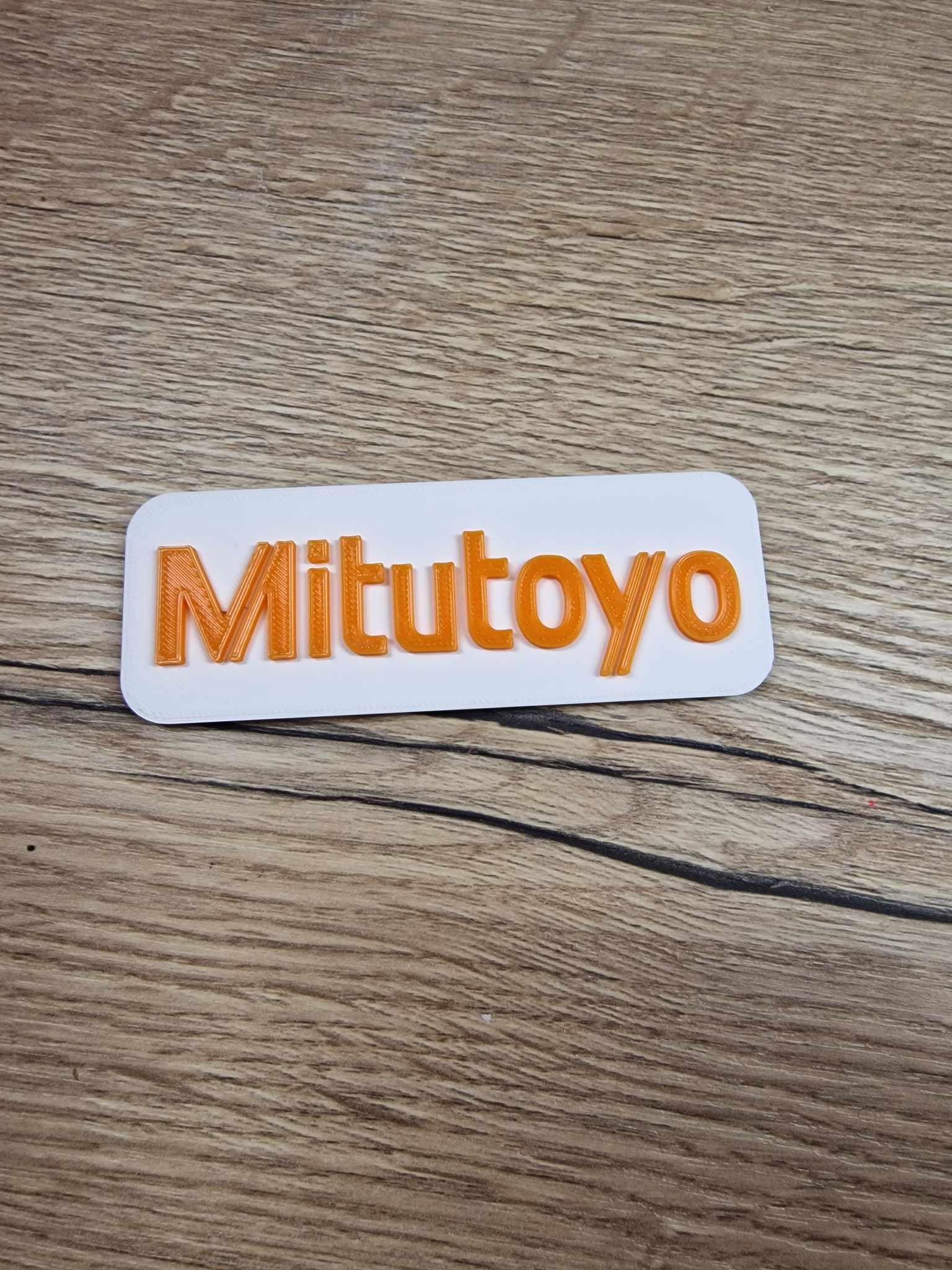 Mitutoyo logo par 3D-PrintThing | Téléchargez gratuitement un modèle ...