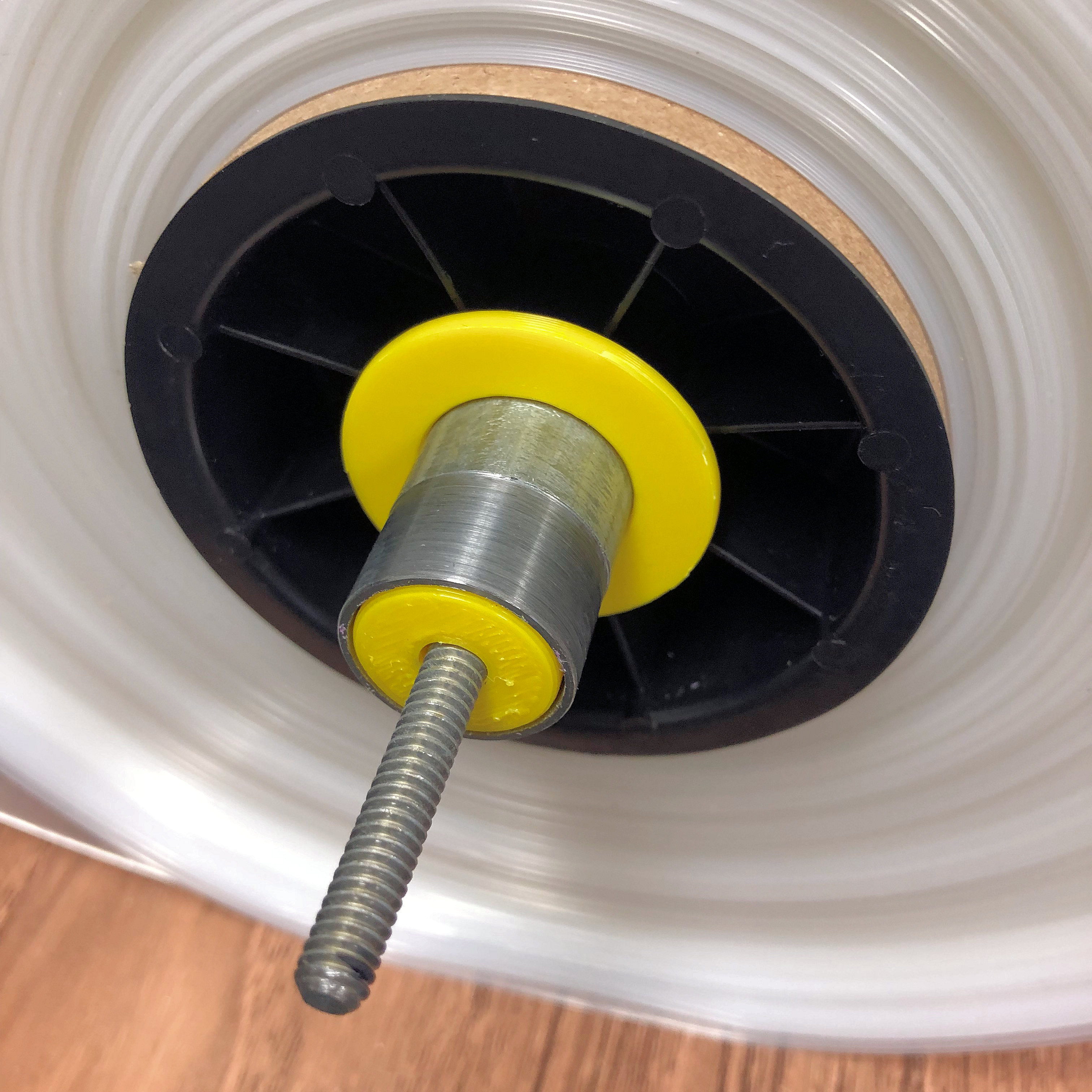 Stand to hold a 10Kg roll of heat/vacuum-seal bag material and/or ...