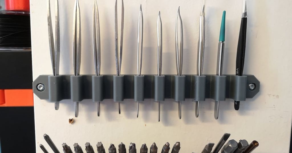 Wall mounted holder for 10 tweezers by Pontus K | Download free STL ...