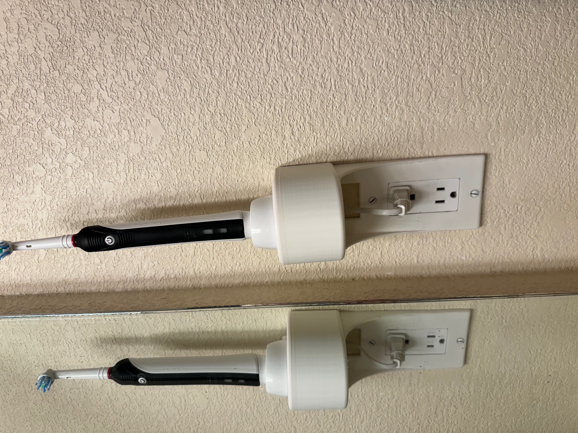 Toothbrush charger power outlet shelf by Dale | Download free STL model ...
