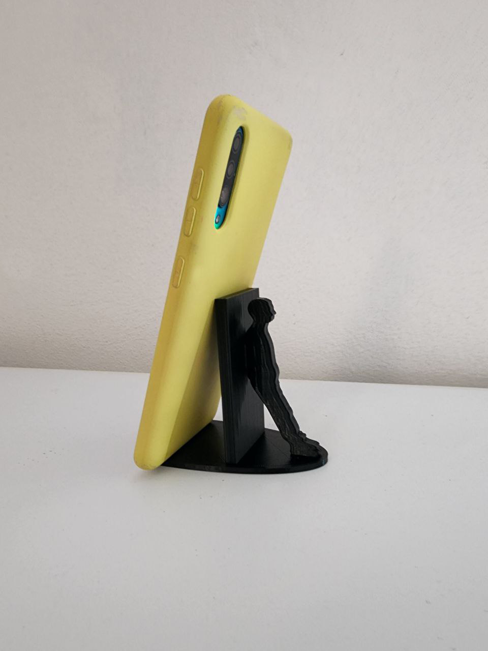 Phone stand of man leaning on wall by ENS Show | Download free STL ...
