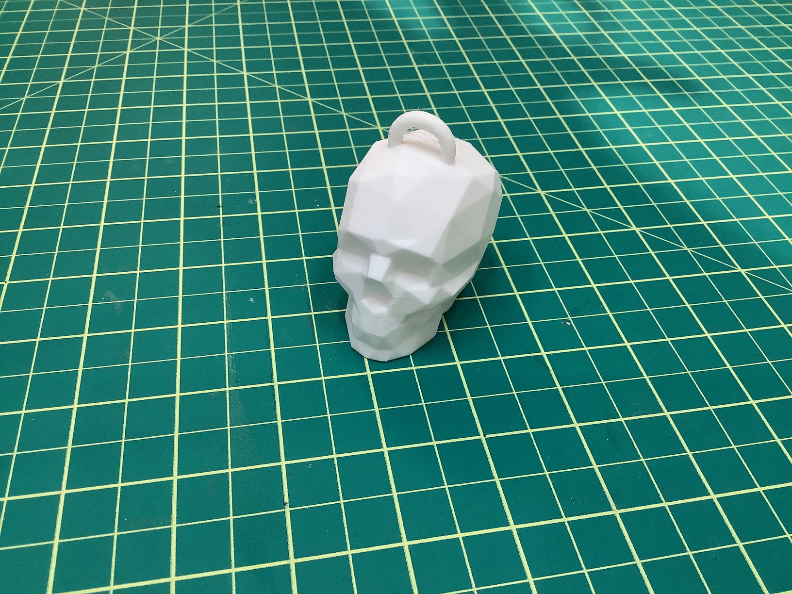 Low poly skull with hanging loop by KatherineLearnsStuff | Download ...
