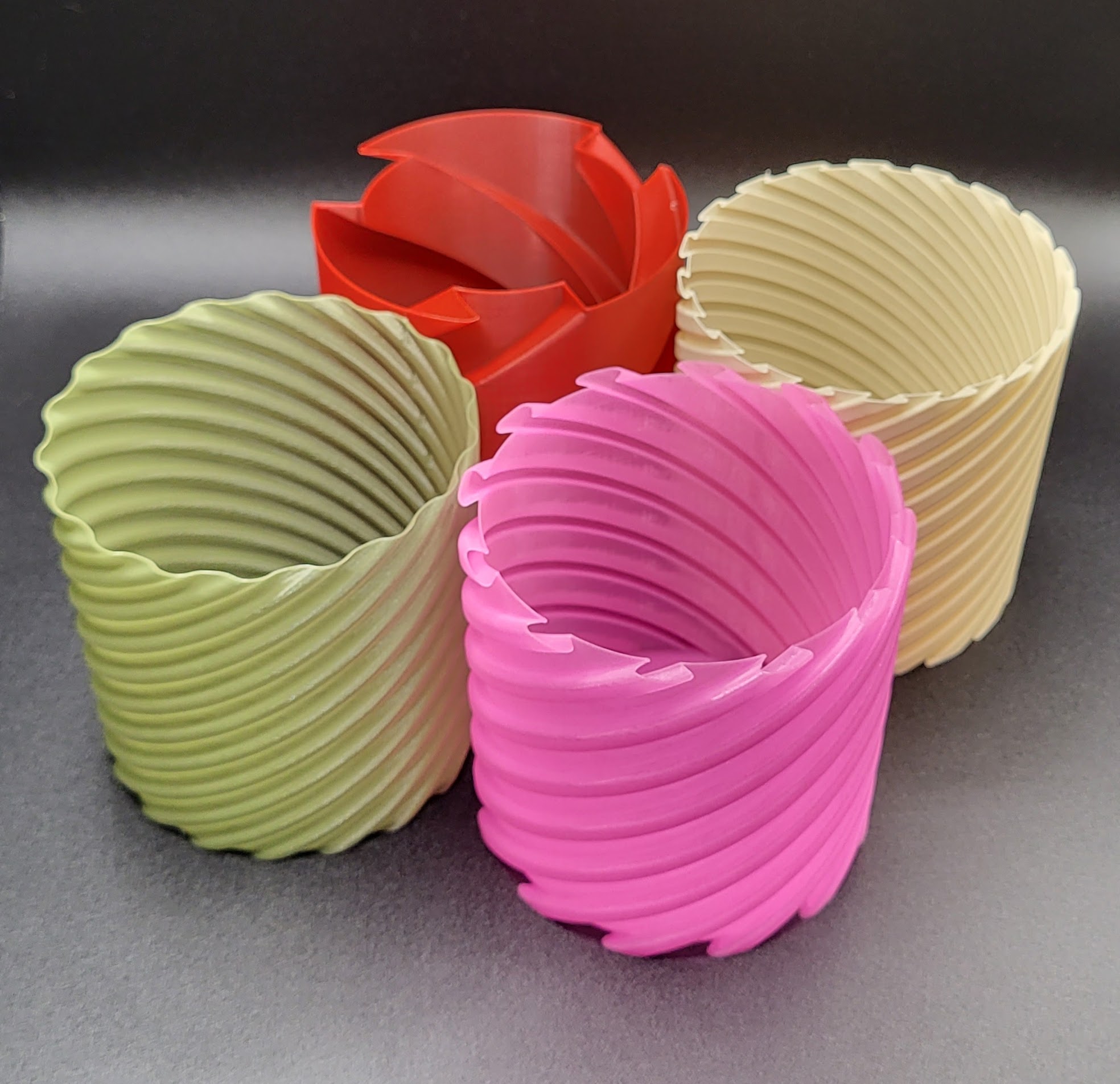 Twistyguys: helicial vase mode models by mozWORLD | Download free STL ...