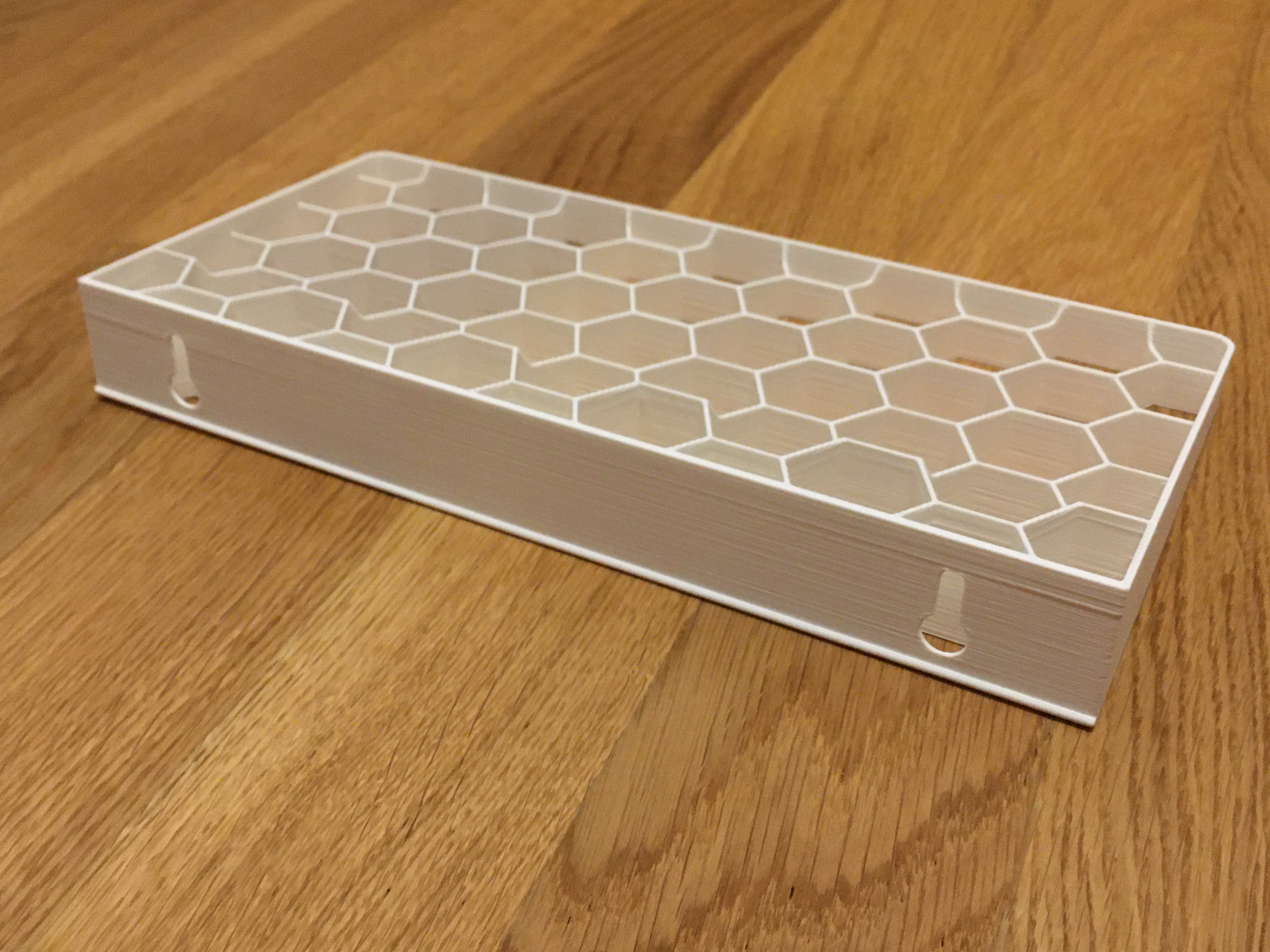 Hexagon shelf with recess for a first aid kit / Regalbord mit ...