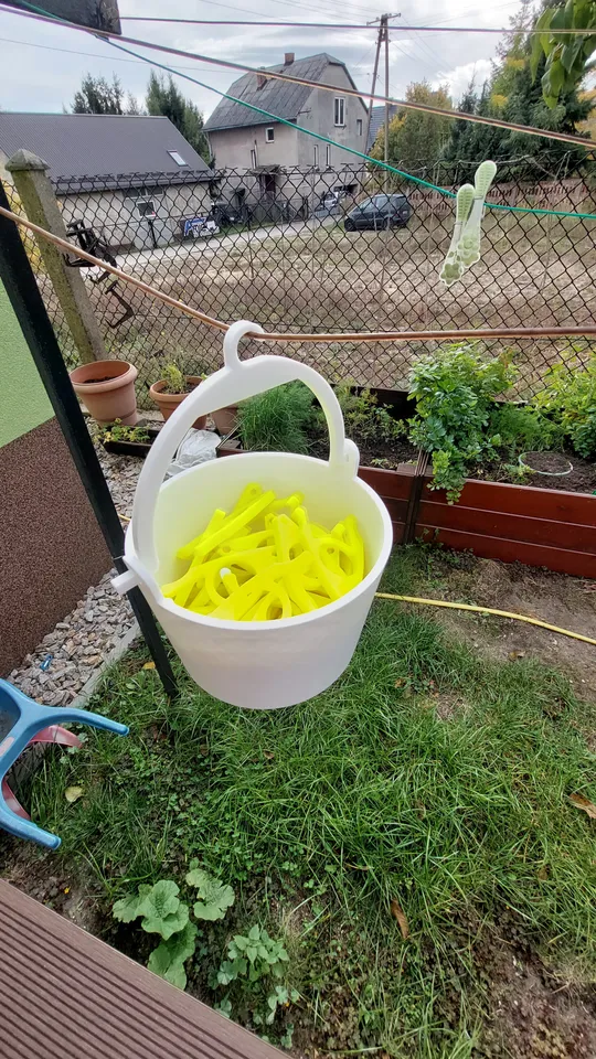 clothespin / laundry clips with a bucket for hanging by przemo_m ...