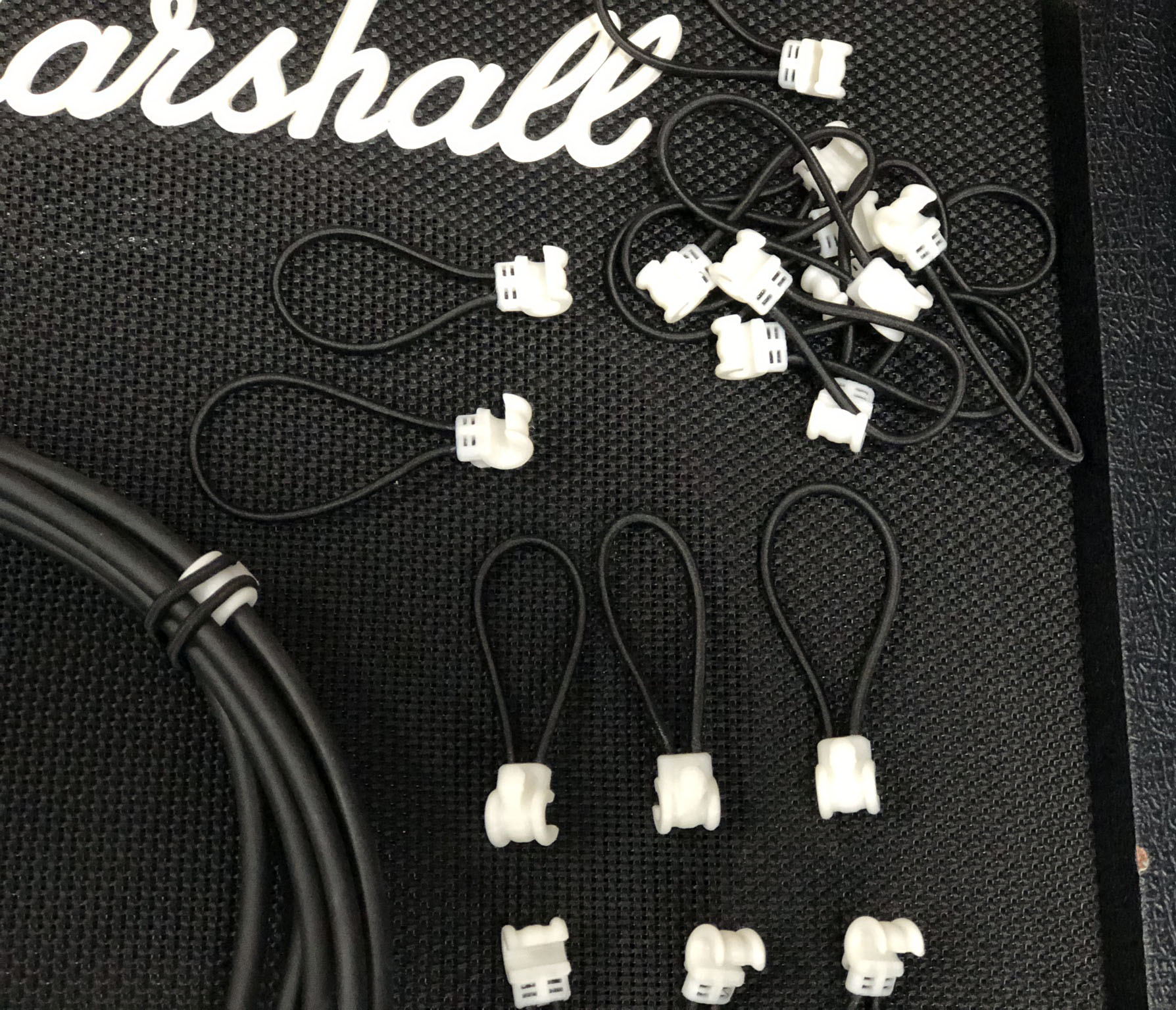 Elastic tie for guitar and instrumental cables by Marat Kapranov ...