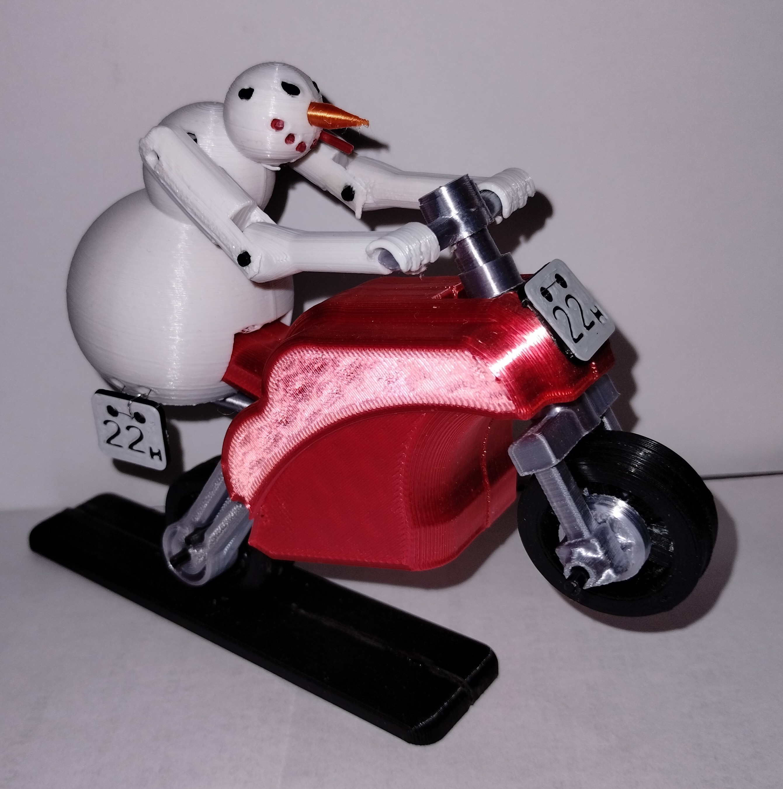 Snowman on an illusion of a motorcycle by Larry Manson | Download free ...