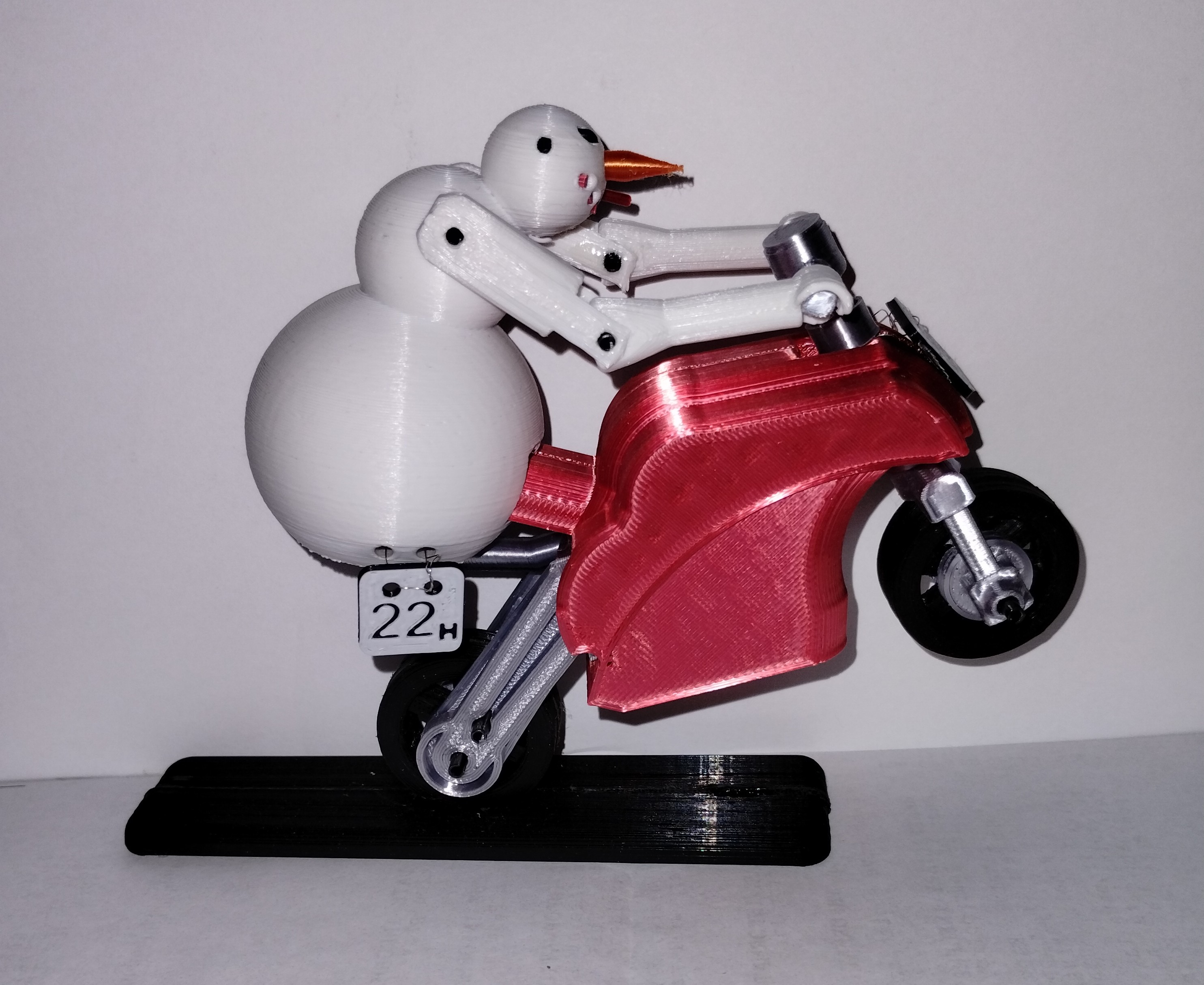 Snowman on an illusion of a motorcycle by Larry Manson | Download free ...