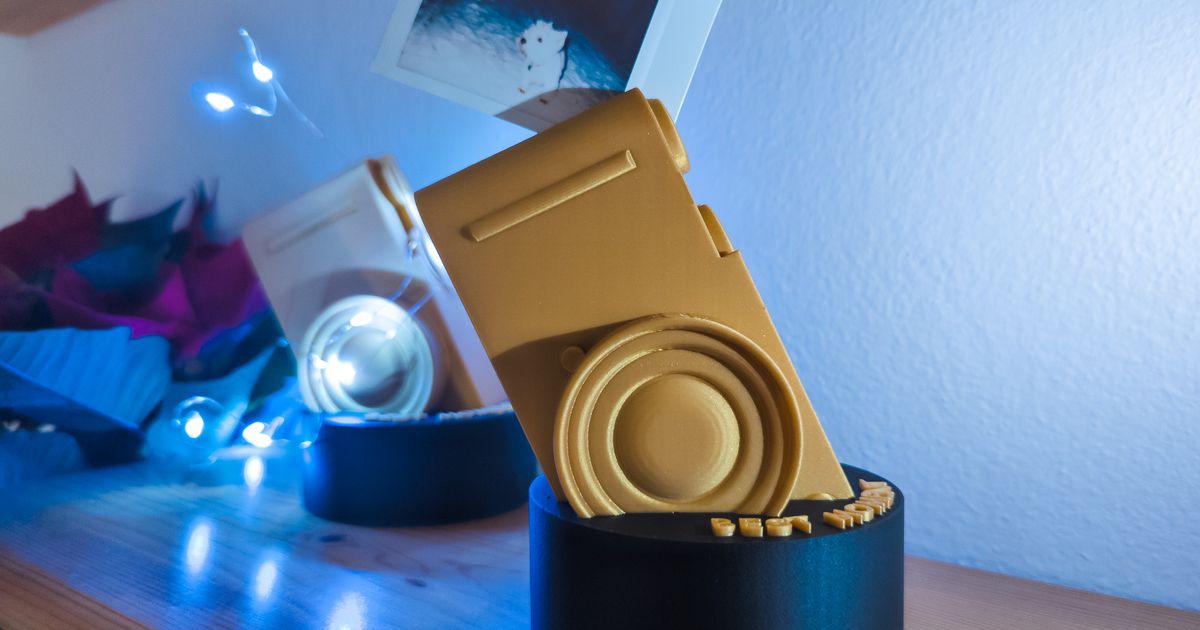 Camera Photo stand/trophy by Made by Printing | Download free STL model ...