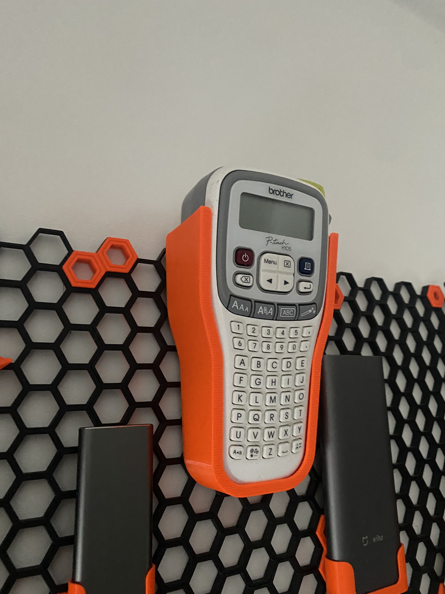 Brother P-Touch holder for honeycomb storage wall by Andrzej | Download ...