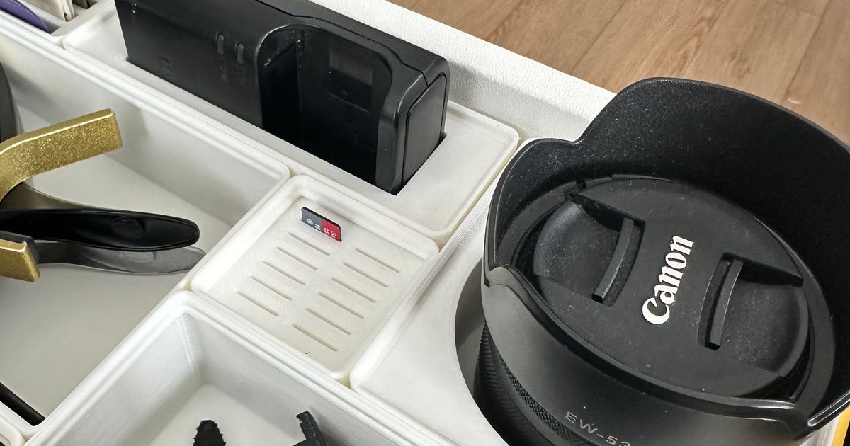 Gridfinity Canon charger holder by Glueshop | Download free STL model ...