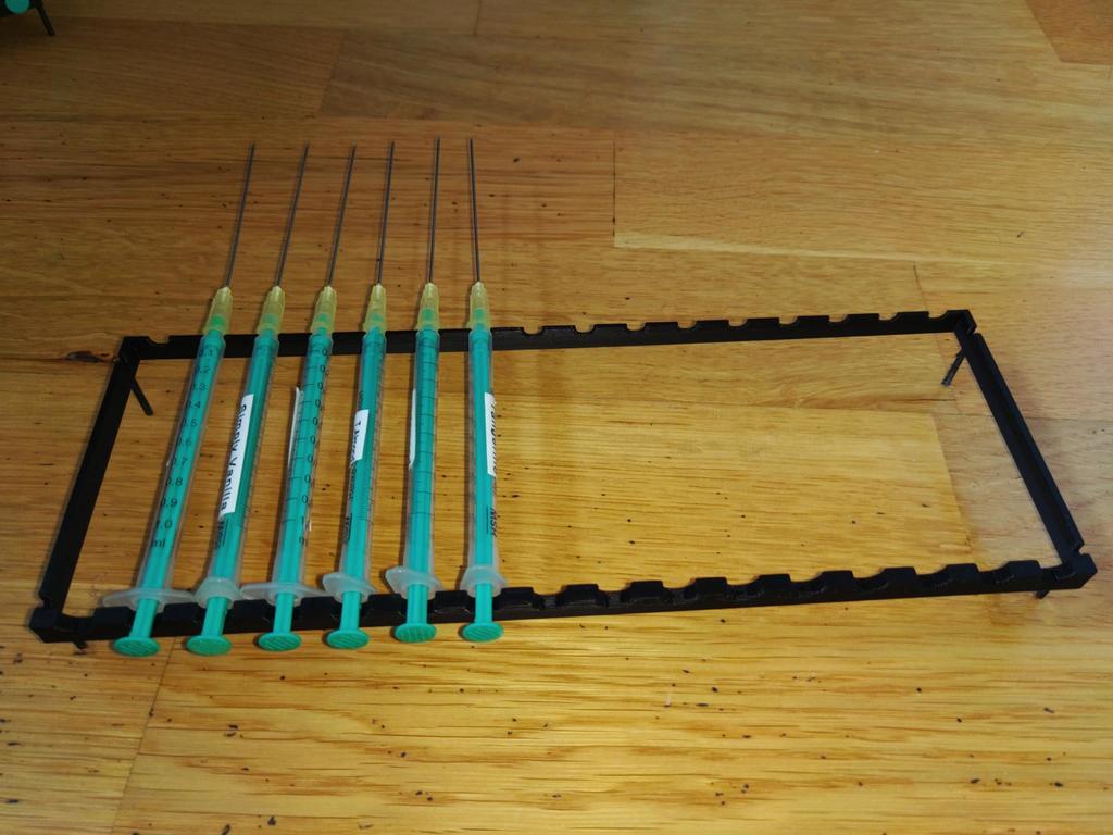 Stackable Parametric Syringe Rack by Stegorex | Download free STL model ...