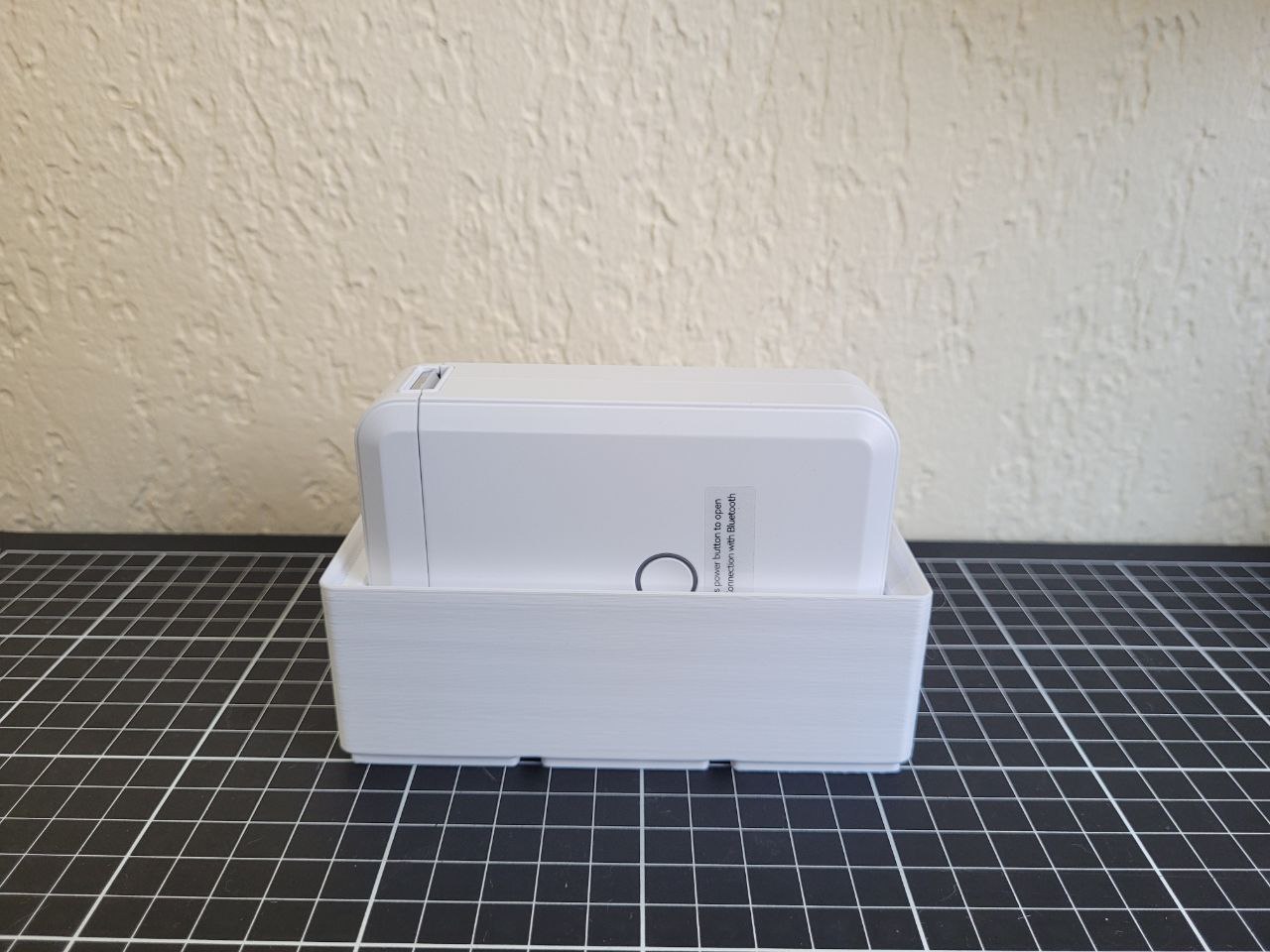 Gridfinity holder for Niimbot D110 label printer by Madson Dias ...