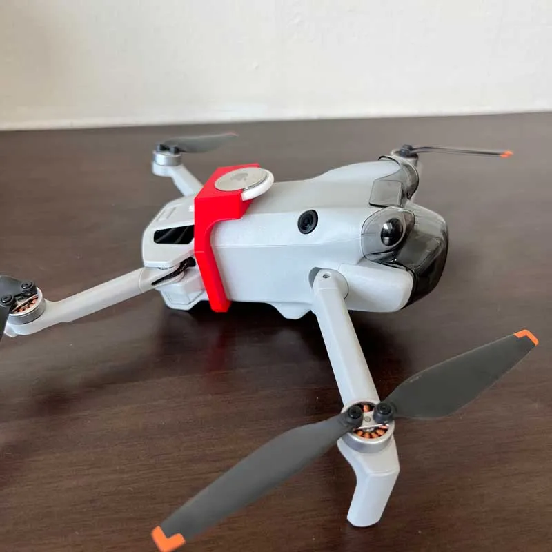 Apple Air Tag mount for DJI Mini 4 Pro drone by msatbsx Download free STL model Printables