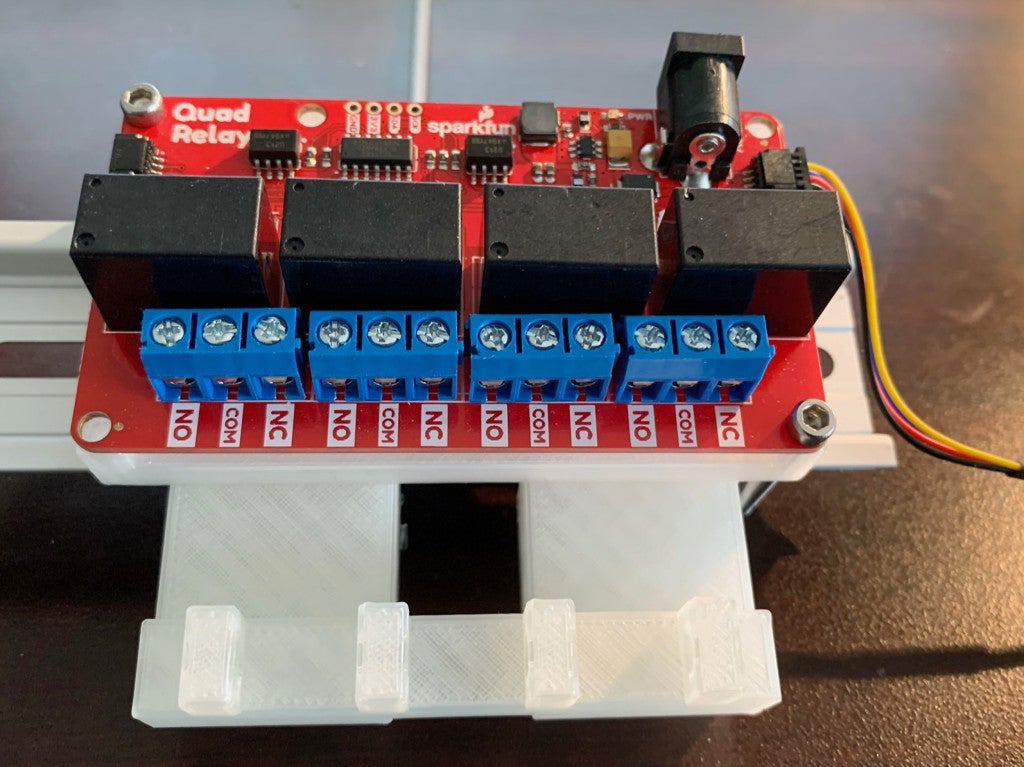 A din rail mount for a Sparkfun Quad Relay. by NotLikeALeafOnTheWind ...