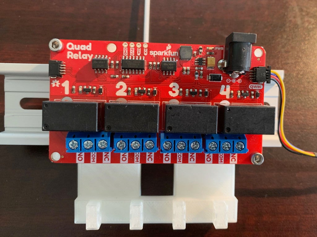 A din rail mount for a Sparkfun Quad Relay. by NotLikeALeafOnTheWind ...