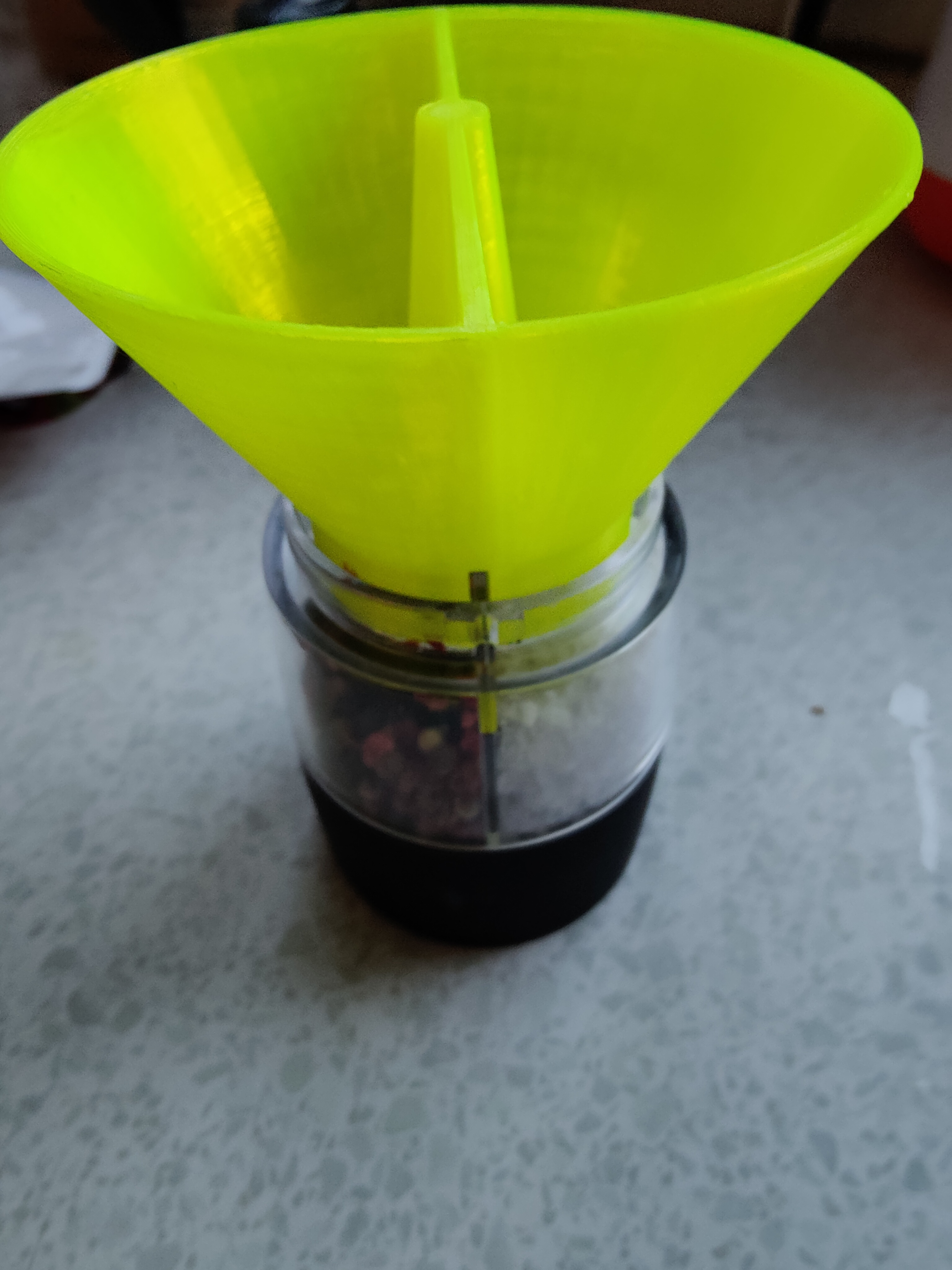 Double funnel for refilling a Tescoma President salt/pepper dispenser ...