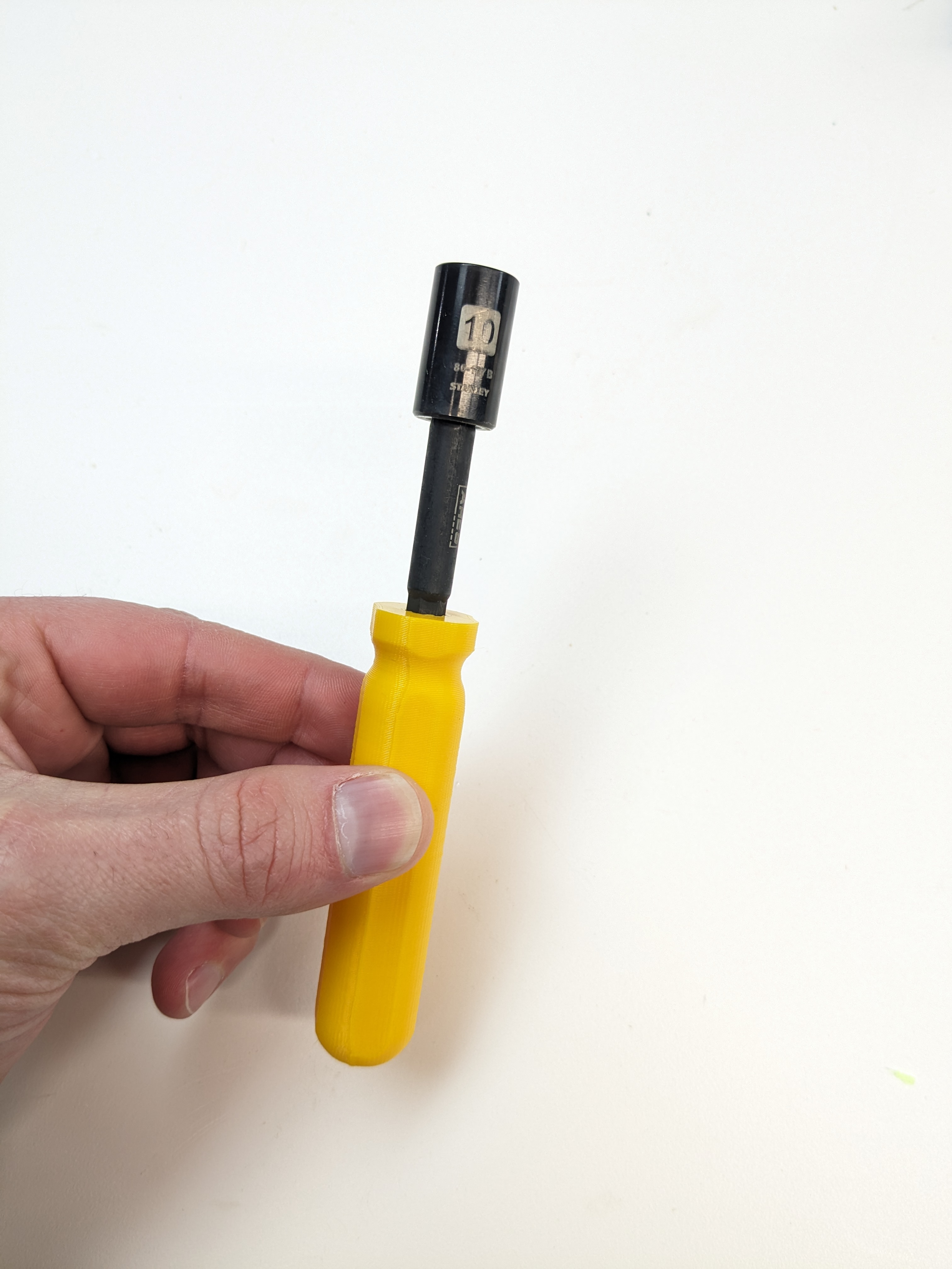 Handle for a nut driver or bit driver (OpenSCAD and Fusion360 included ...