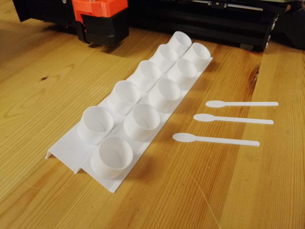 Paint tube holder and a small spoon for mixing paints by shelm ...