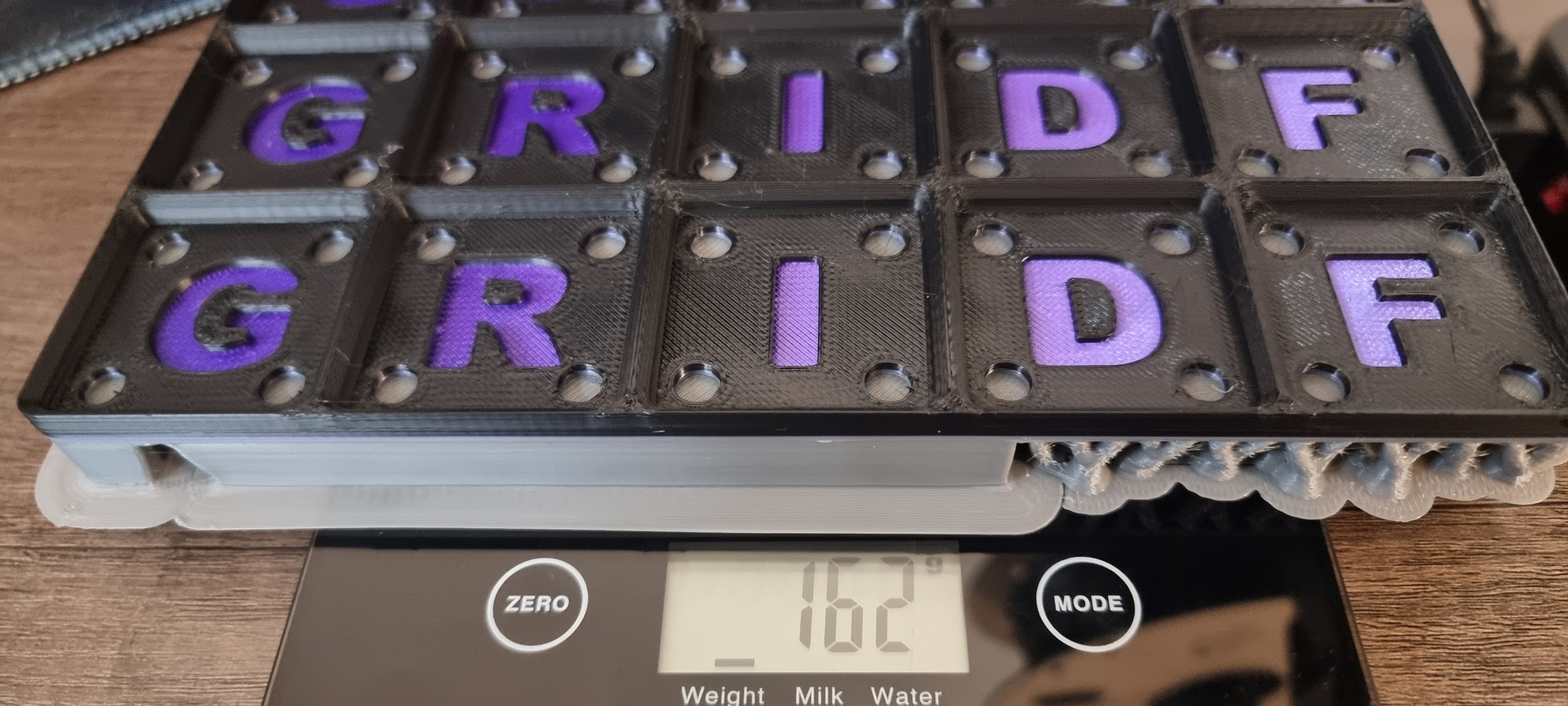 Gridfinity 4x10 sliding baseplate with magnets and text by Ruben ...
