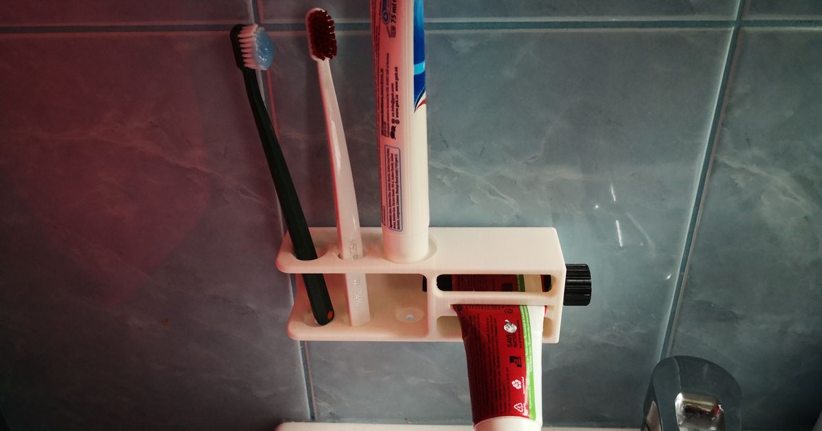 Toothbrush holder with integrated toothpaste squeezer by Bobino ...