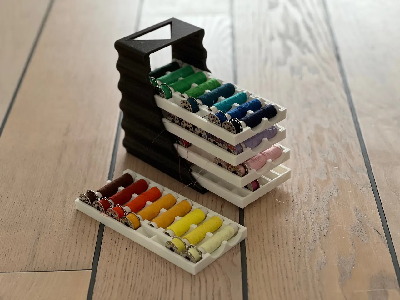 Sewing thread and bobbin roll holder rack by HenrikHorne | Download ...