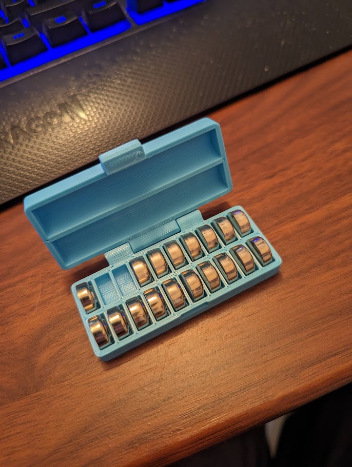 Print-in-Place Case for LR44 Batteries (updated text) by Alluvian ...
