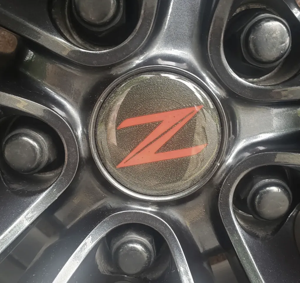 370Z Stock Wheel Center Caps by Robot7 | Download free STL model ...