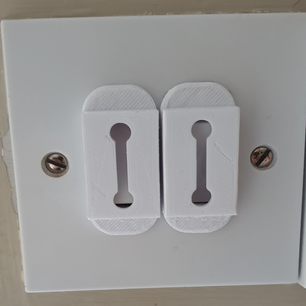 UK light switch lock covers by Liviu Chiribuca | Download free STL ...
