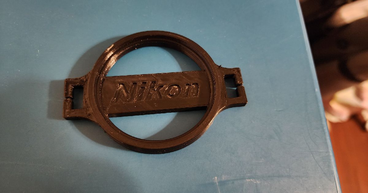 Nikon Lens Cap Clip by George | Download free STL model | Printables.com
