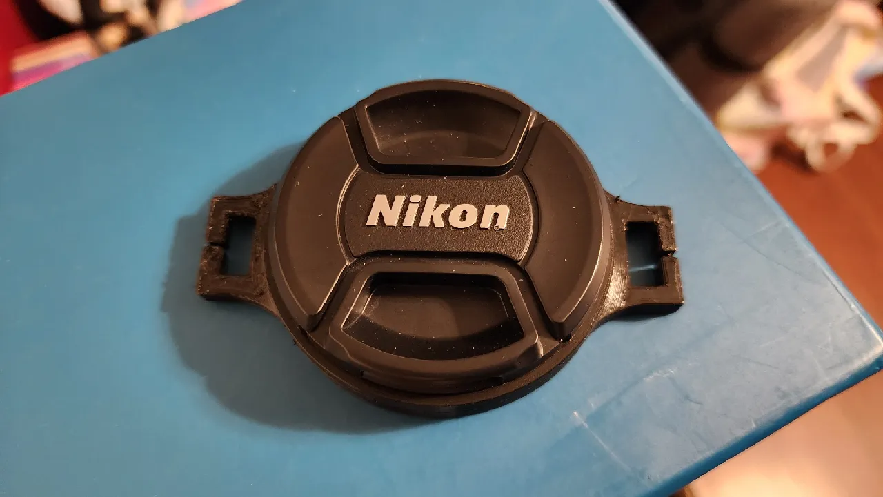 Nikon Lens Cap Clip by George | Download free STL model | Printables.com