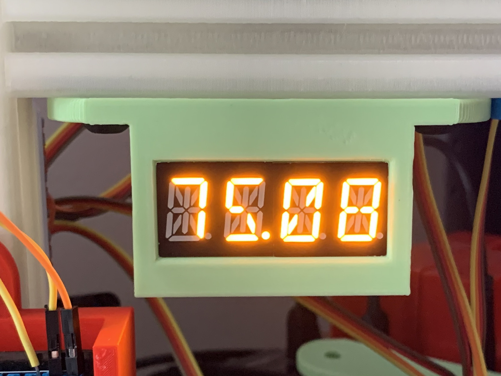 A four digit alphanumeric led display holder for an 8020 series 10 ...